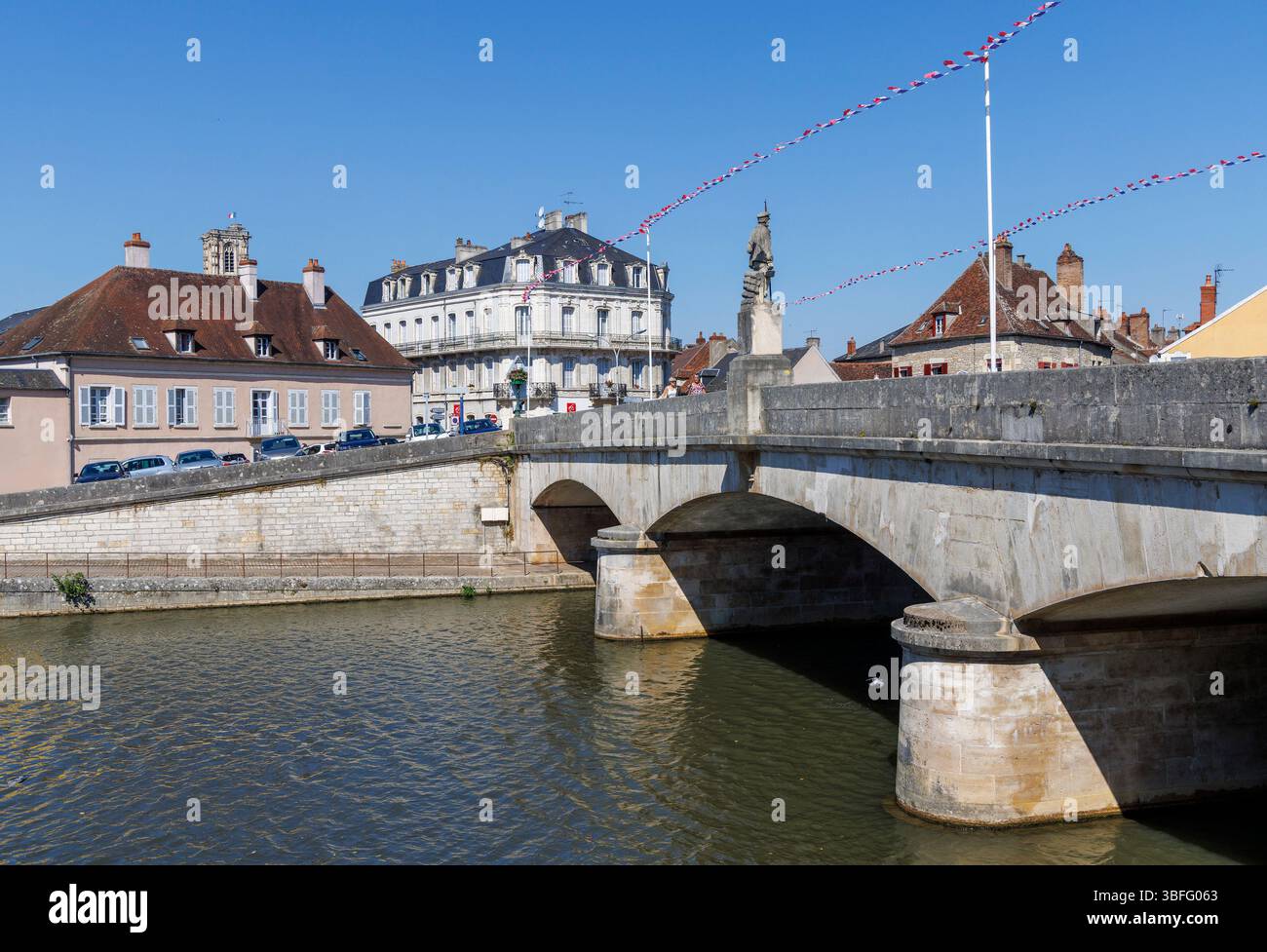 Bridge over the Yone river with statue on parapet, Clamecy, France ...