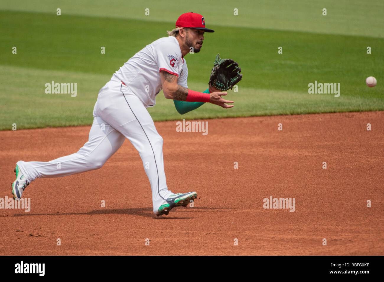 Cleveland Guardians' Gabriel Arias prepares to catch a hit by Los ...