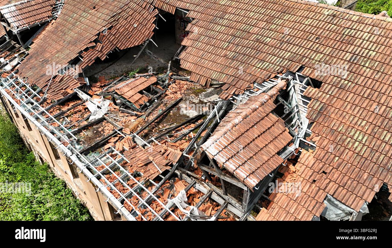 an old collapsed tiled roof as an aerial photograph Stock Photo - Alamy