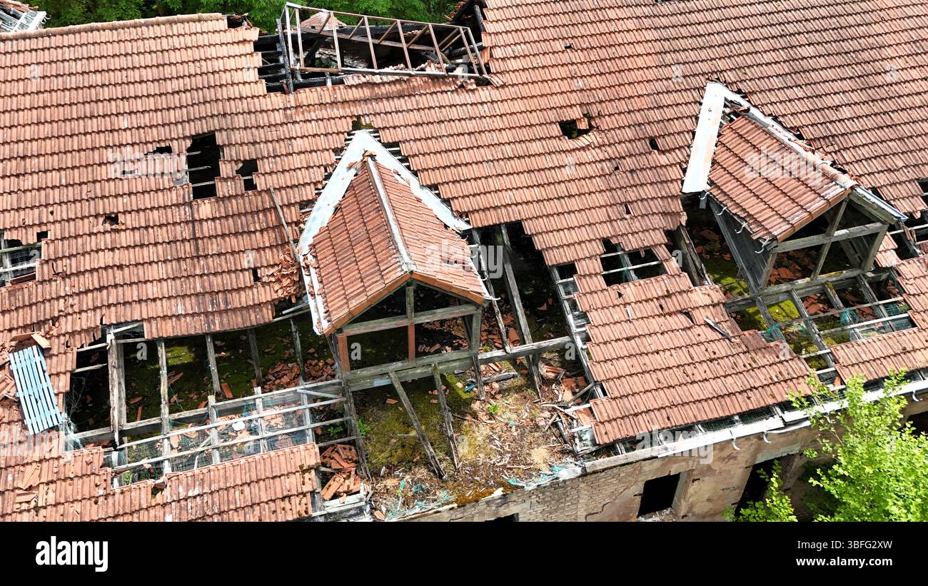 an old collapsed tiled roof as an aerial photograph Stock Photo - Alamy