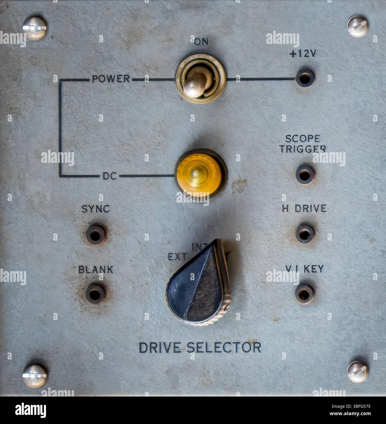 vintage electronic control panel with a metal surface that has signs of ...