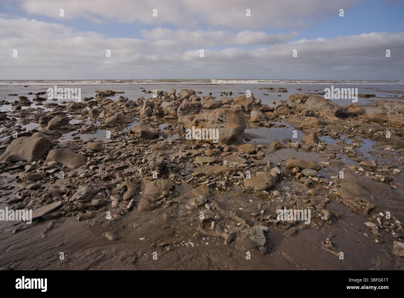 Beach scattered rock formations hi-res stock photography and images - Alamy