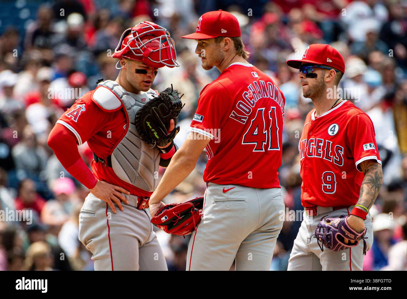 Los Angeles Angels' Logan O'Hoppe, left, has a mound meeting with Jack ...