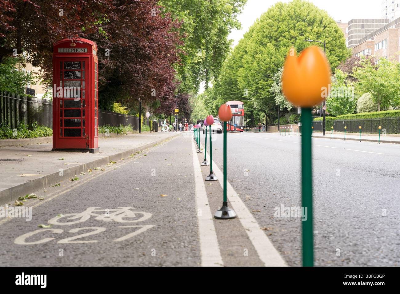 London, UK – 1st June 2025: A row of colorful plastic tulips has sprung ...