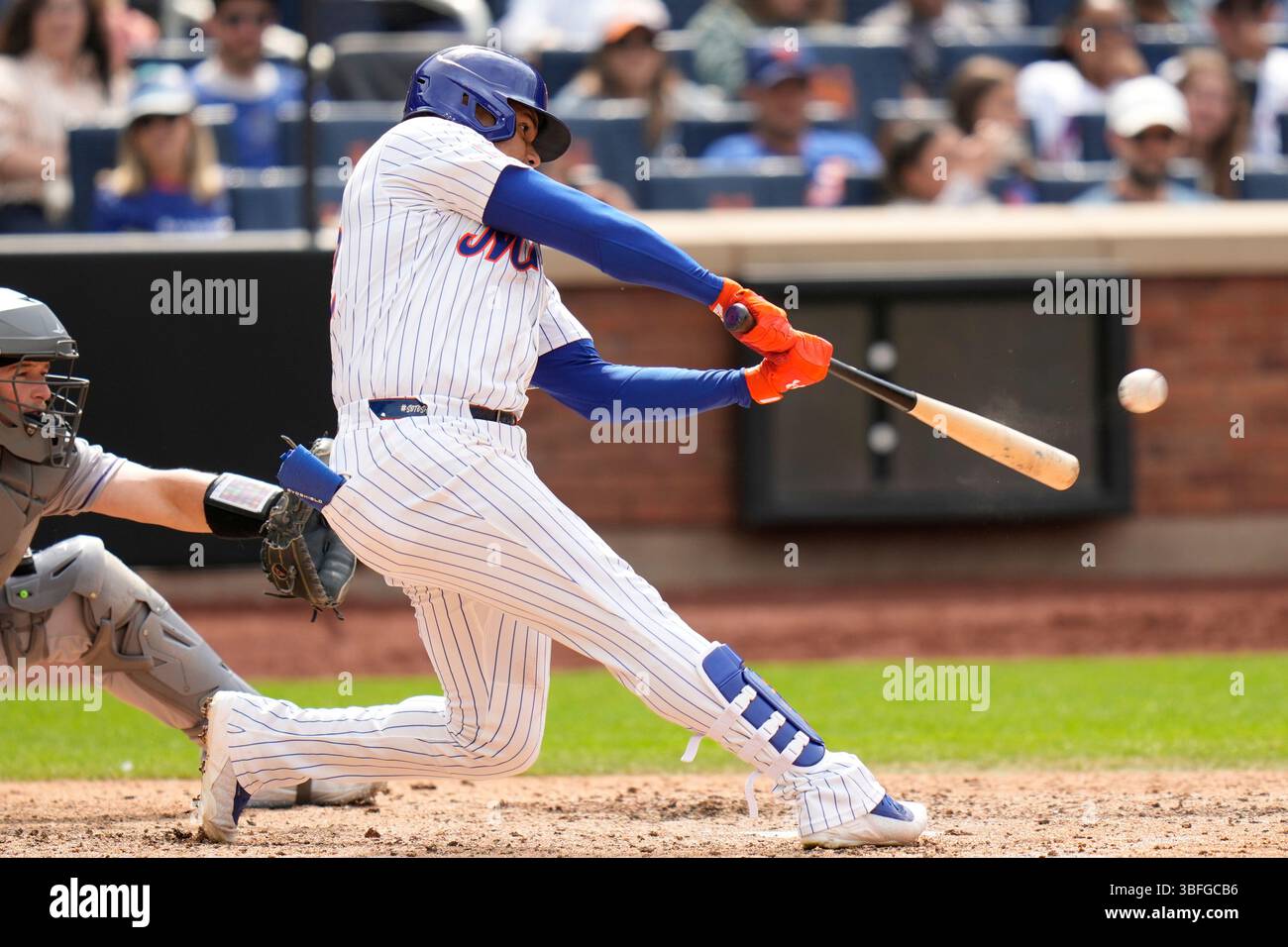 New York Mets' Juan Soto hits a solo home run during the eighth inning ...