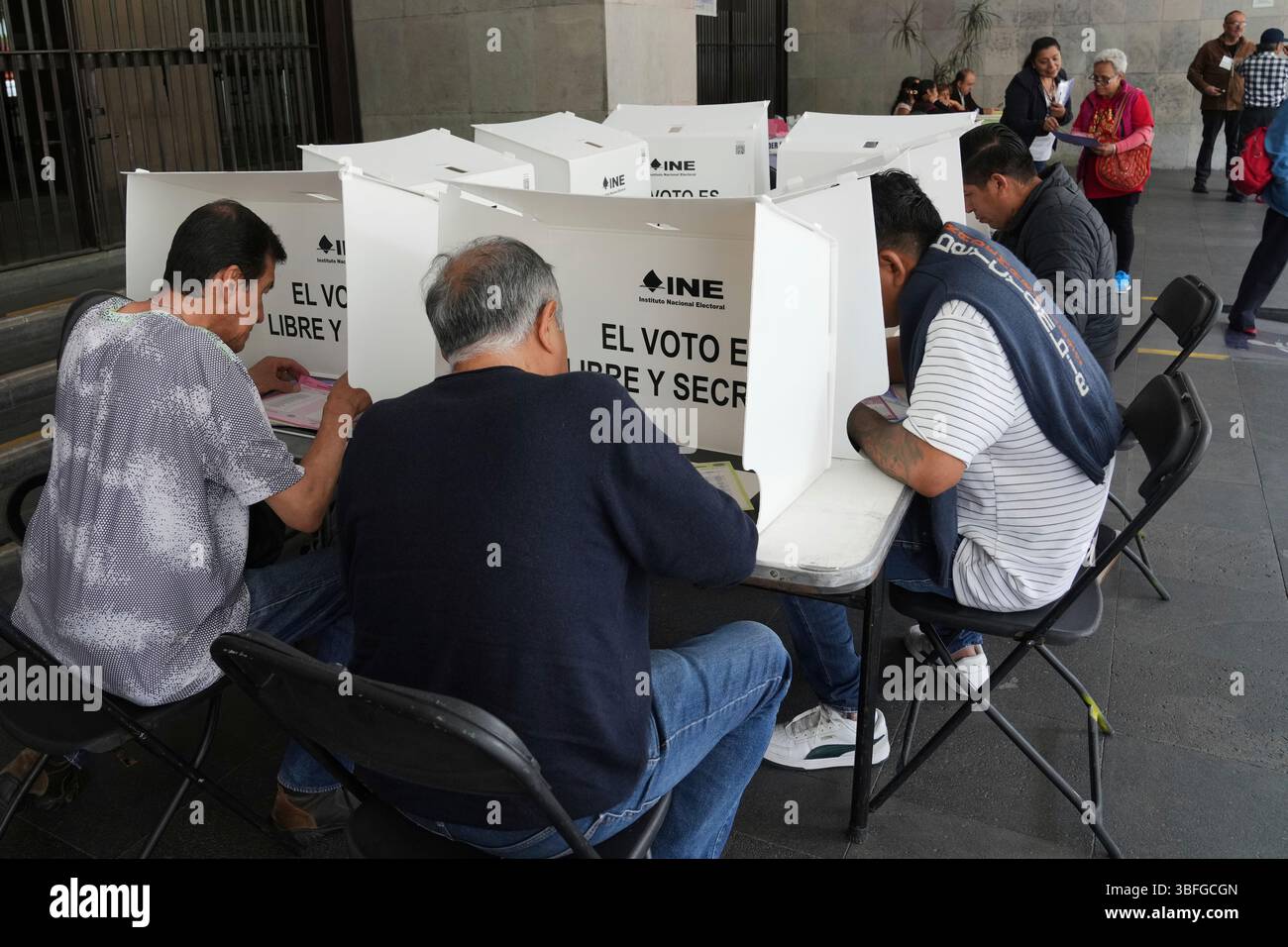 Voters cast their ballots in Mexico's first judicial elections, in ...