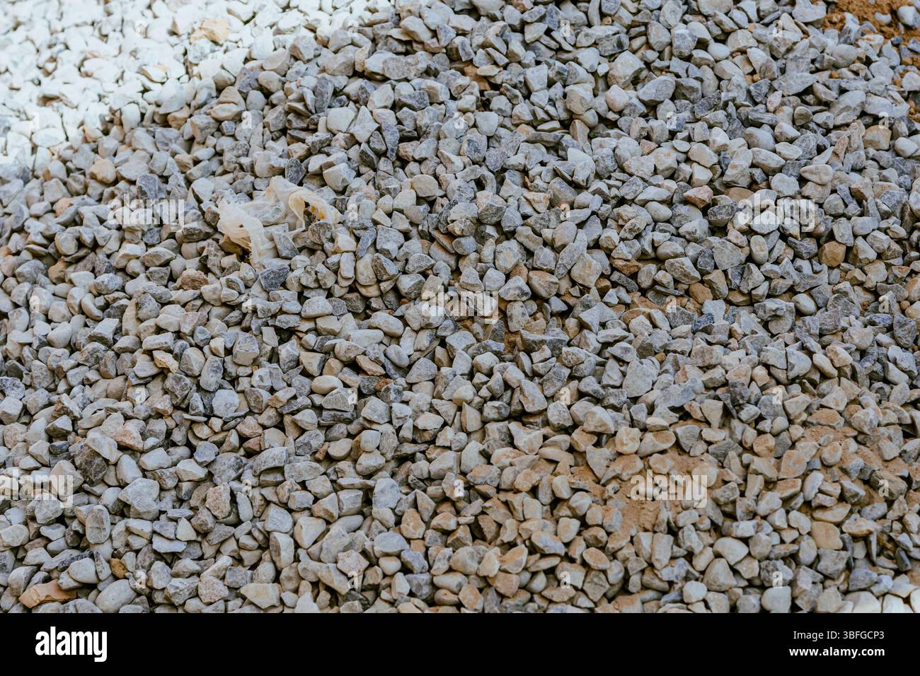 Crushed rock. Small rocks ground. Crushed stone road building material ...