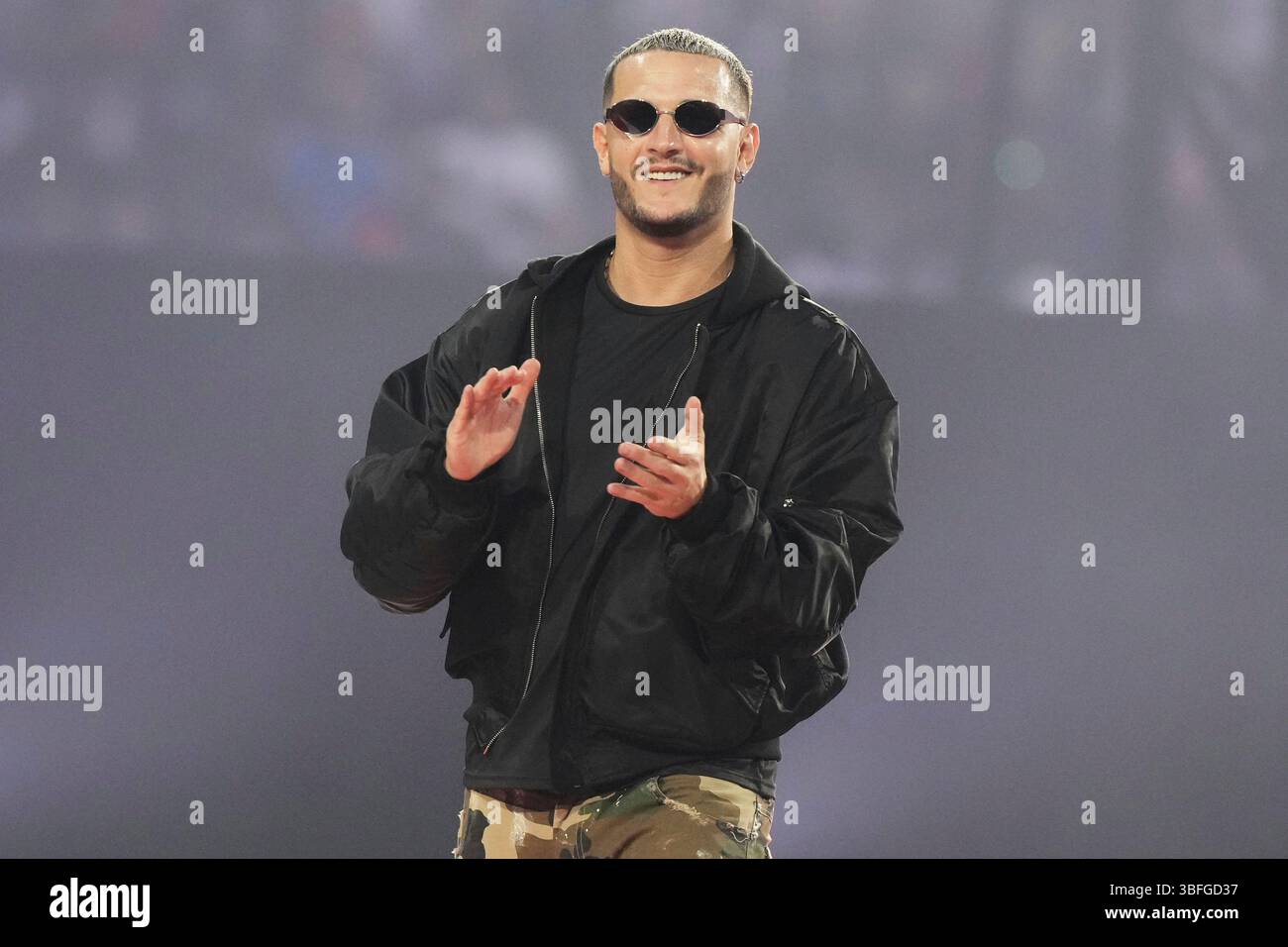 French rap artist DJ Snake performs during a celebration after PSG won ...