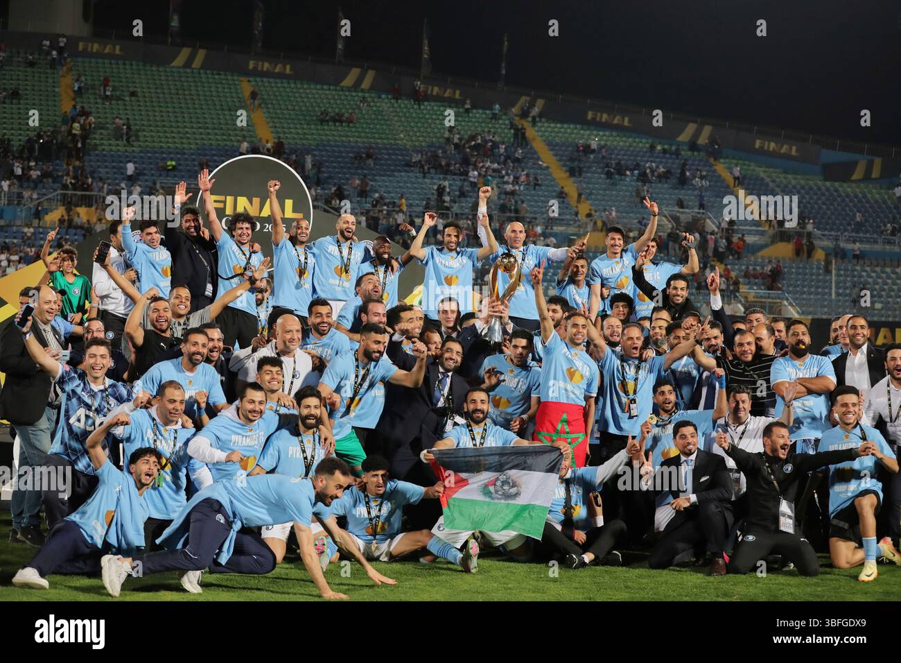 Pyramids players pose for a photo after winning the CAF Champions ...