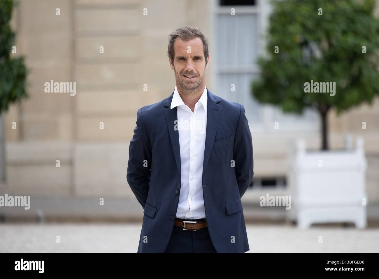 French retired tennis player Richard Gasquet poses as he arrives at the ...