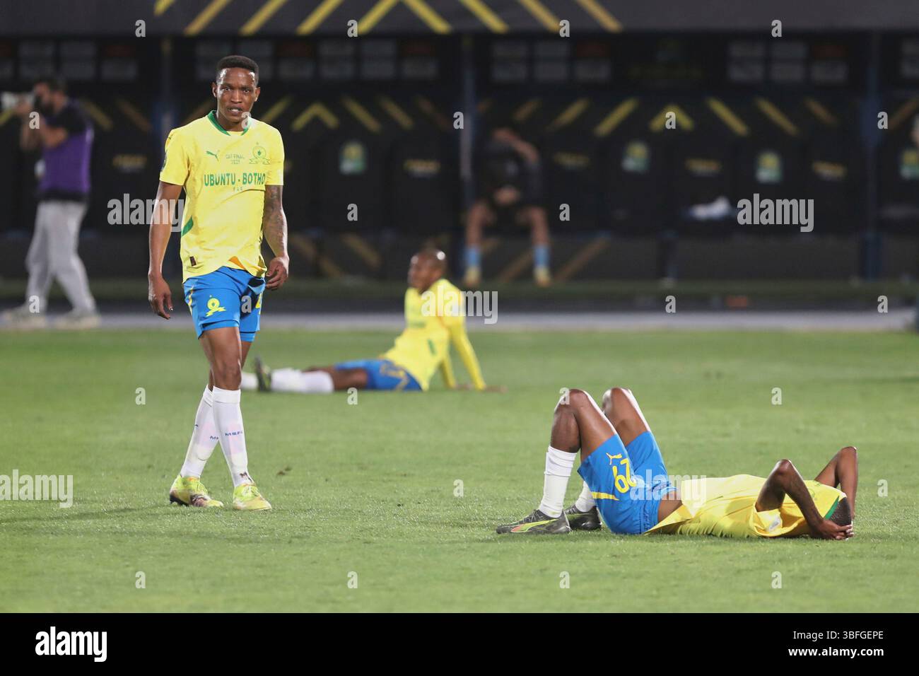 Mamelodi Sundowns players react after losing the CAF Champions League final second leg soccer ...