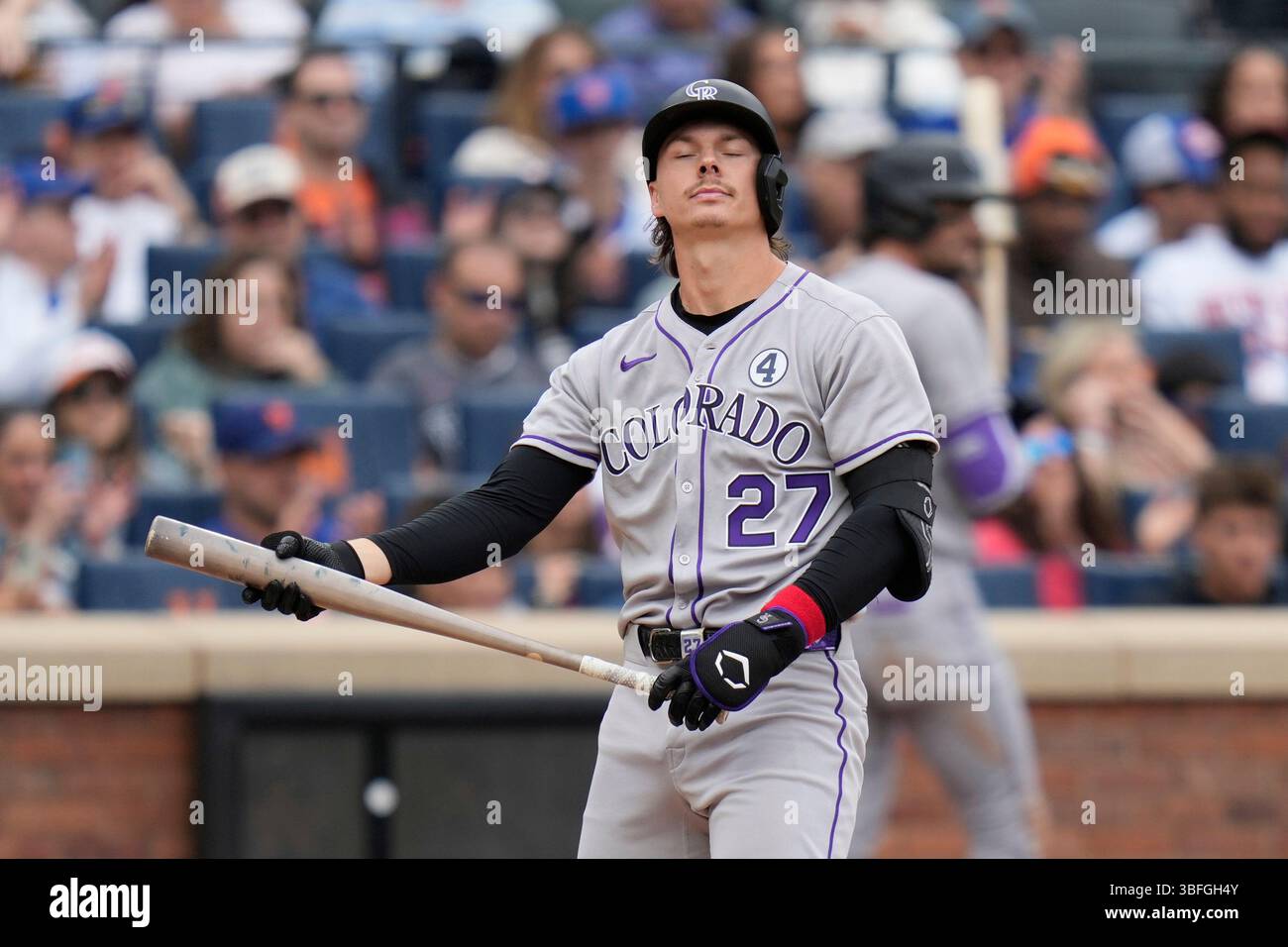 Colorado Rockies' Jordan Beck reacts after striking out swinging during ...