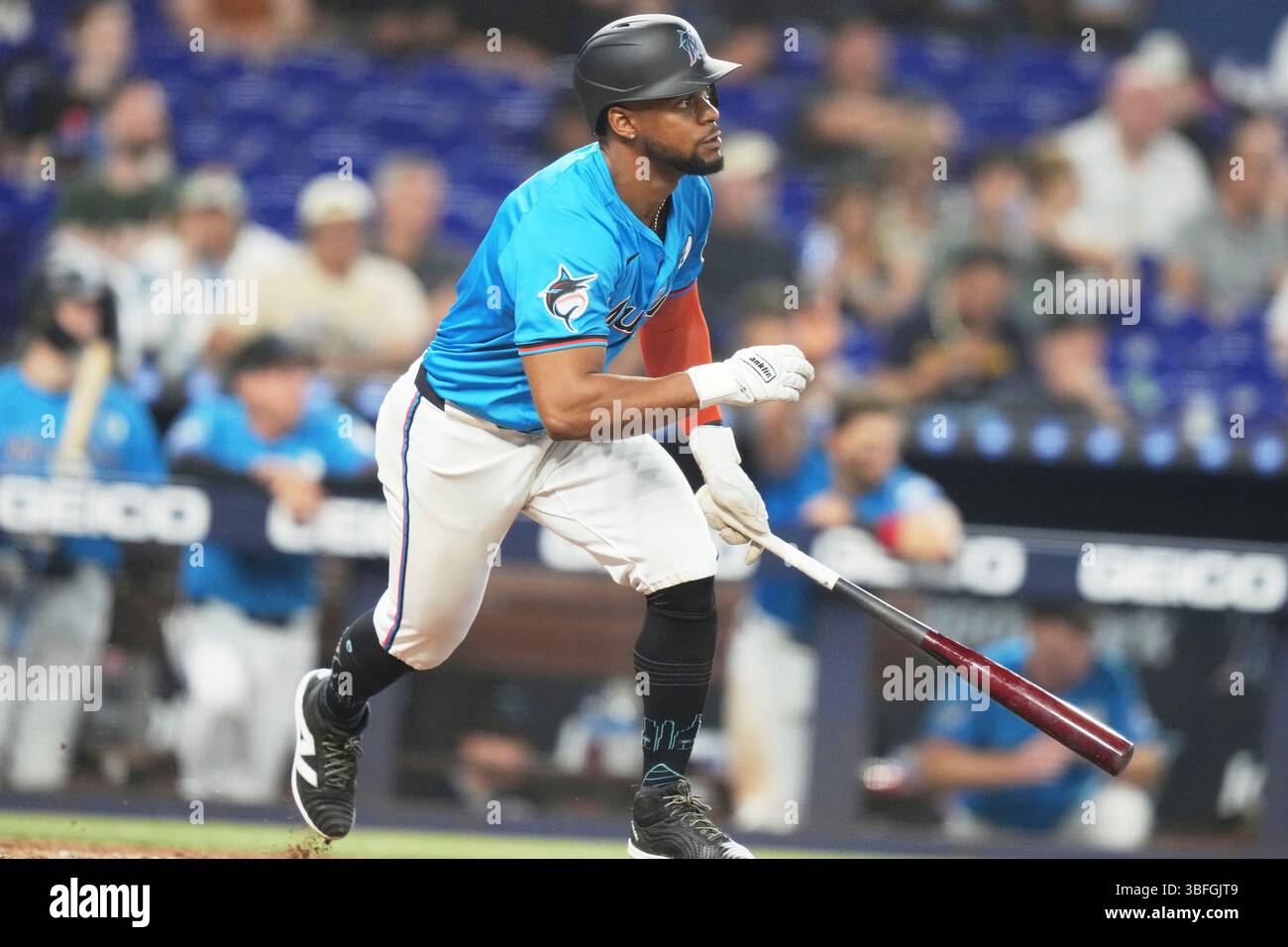 Miami Marlins' Otto Lopez watches after hitting a RBI-single to score ...