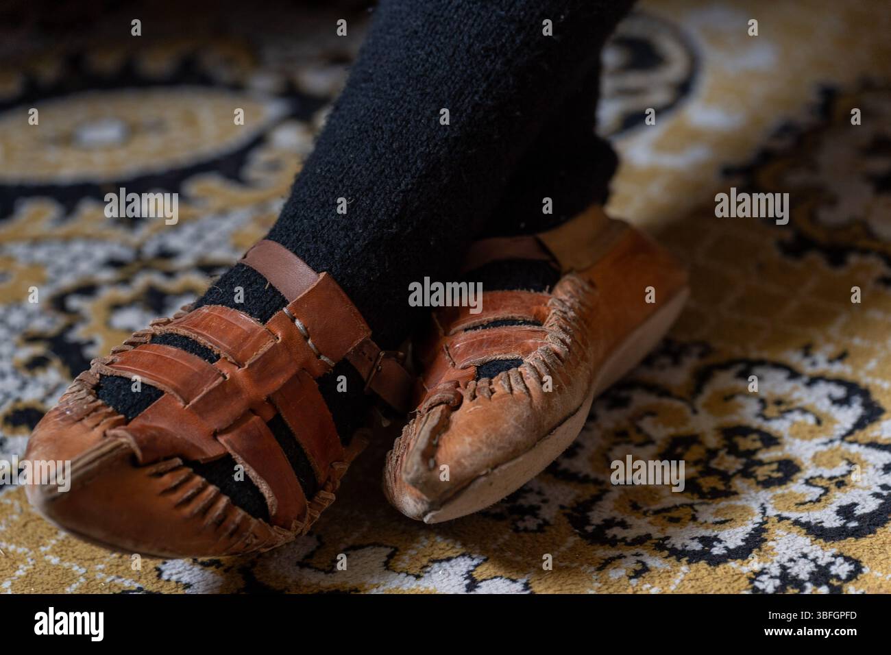 Heritage in Every Step. Crossed Feet, Close up Stock Photo - Alamy