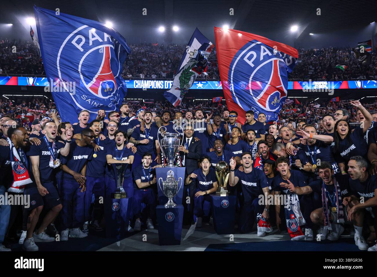 Paris Saint-Germain players celebrate with teammates during a ceremony ...