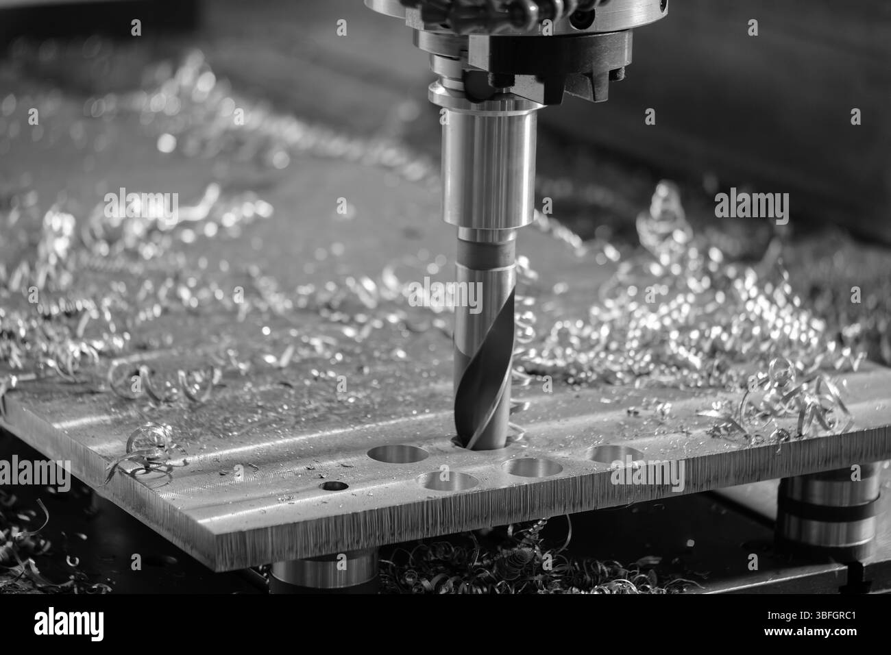 CNC modern milling machine produces a metal detail industrial concept ...