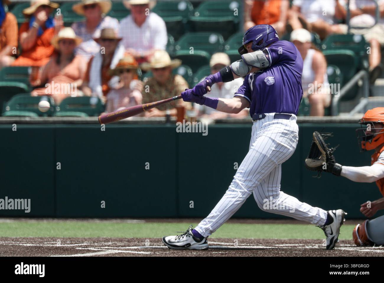 AUSTIN, TX - JUNE 01: Kansas St. catcher Keegan O'Connor (18) hits the ...