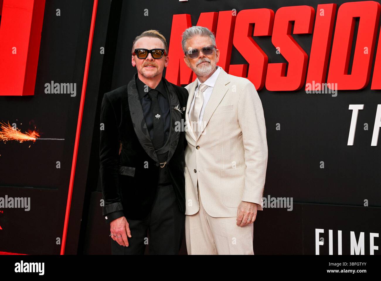 Simon Pegg, left, and Christopher McQuarrie attend the "Mission ...