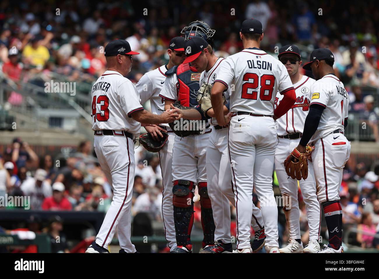 ATLANTA, GA - JUNE 01: Manager Brian Snitker #43 of the Atlanta Braves pulls Bryce Elder #55 ...