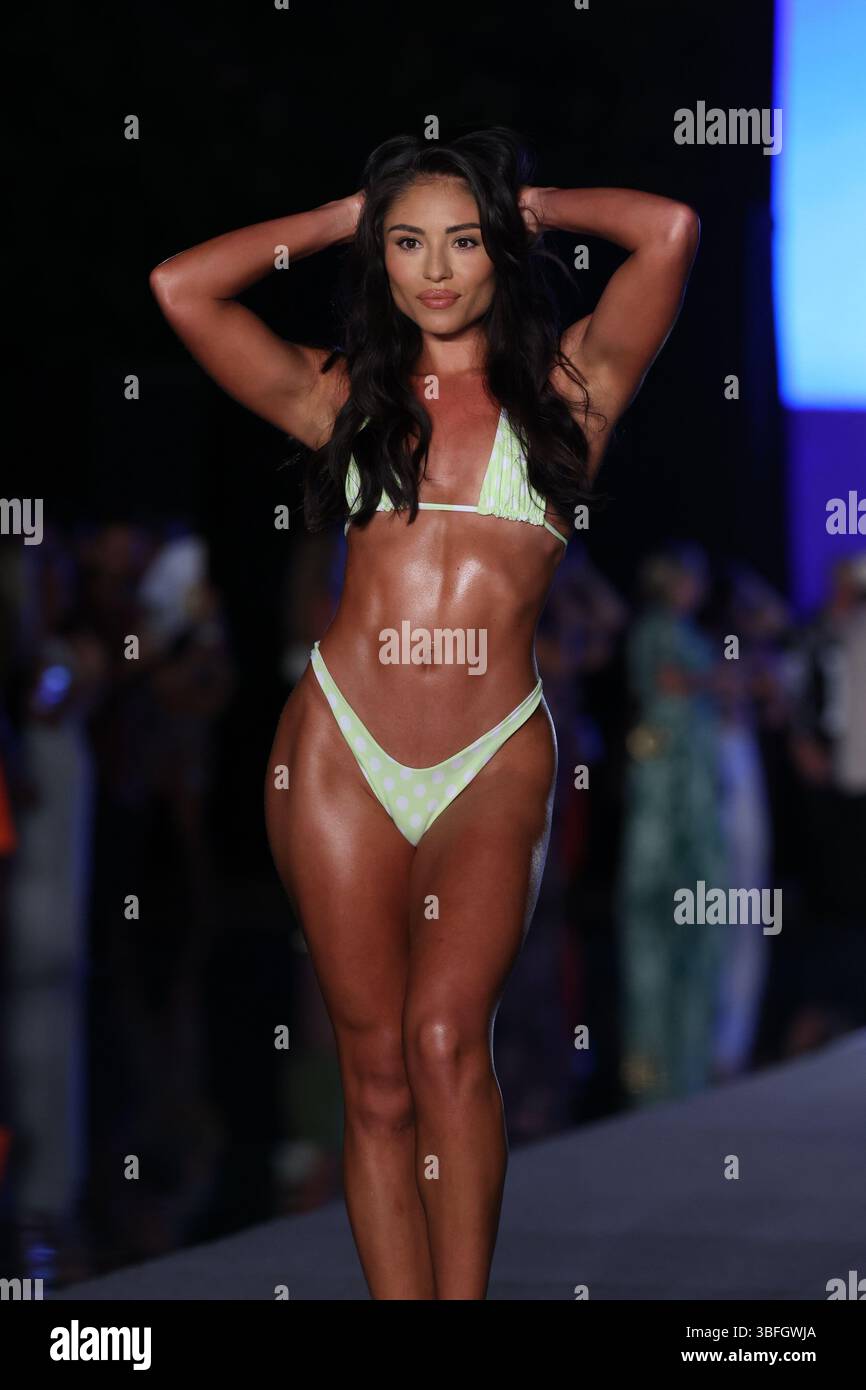 MIAMI BEACH, FLORIDA - MAY 31: Leticia Martinez walks the runway at the Sports Illustrated ...