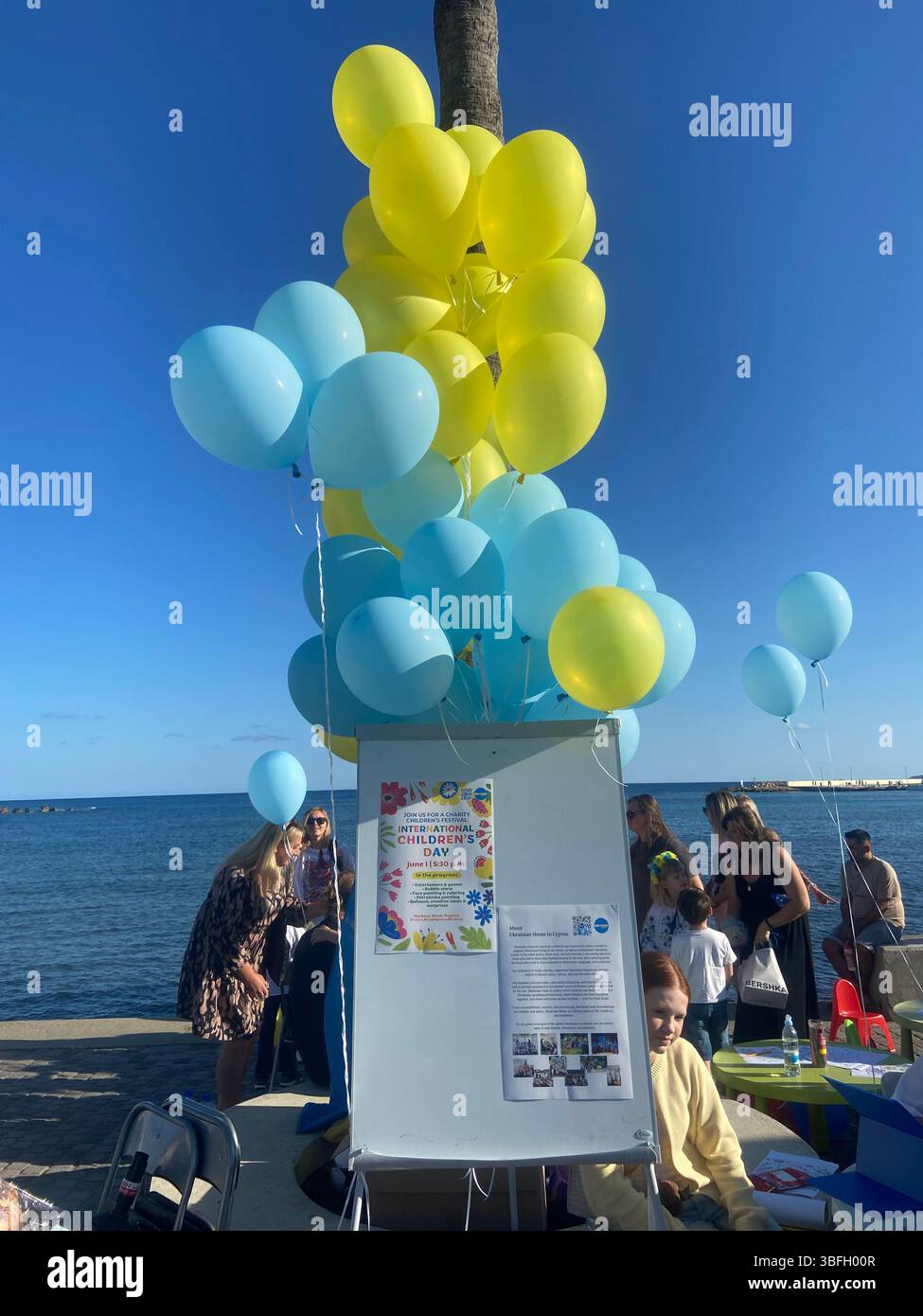 Balloons and posters at paphos harbour cyprus hi-res stock photography ...