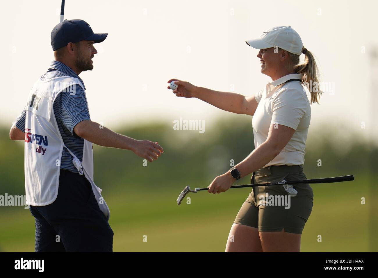 Maja Stark, of Sweden, hugs her caddie after winning the U.S. Women's ...