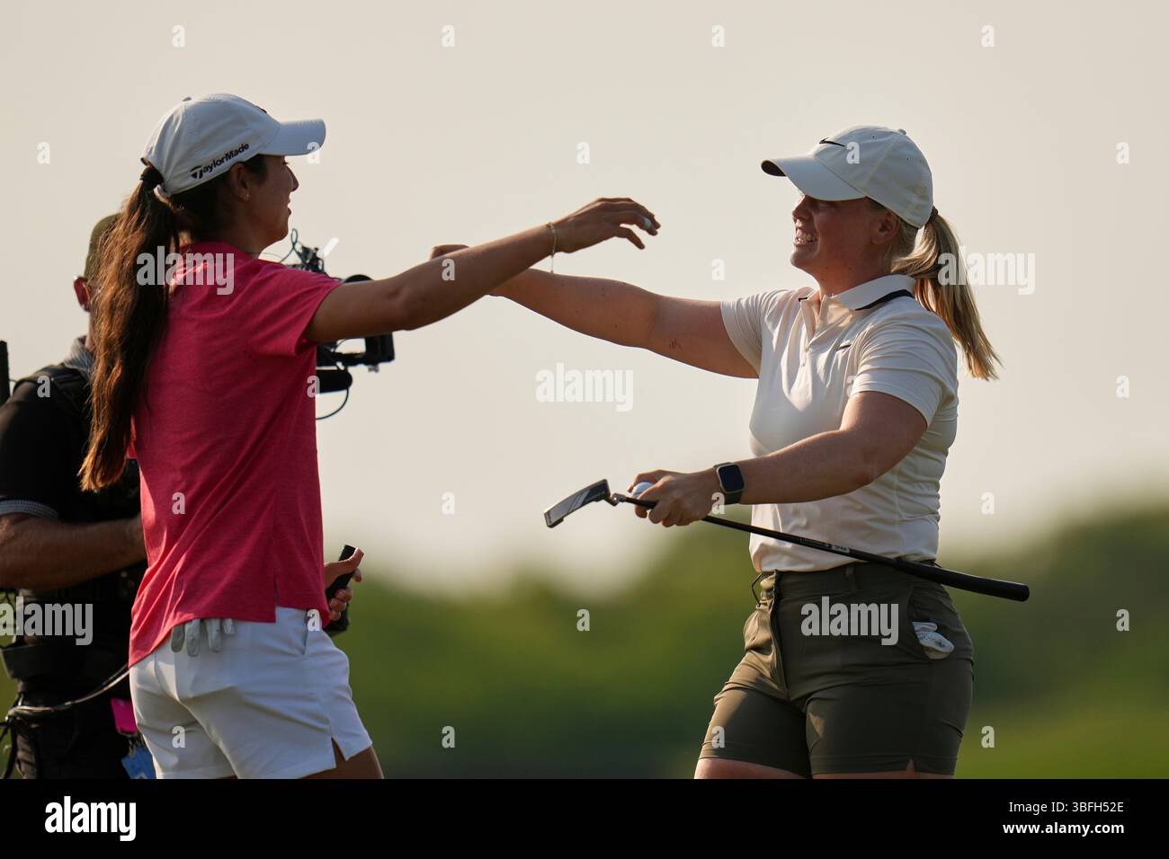 Maja Stark, of Sweden, hugs Julia Lopez Ramirez, of Spain, after ...