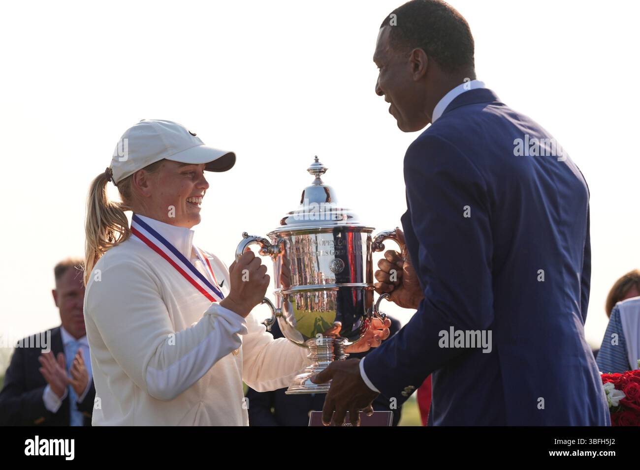 Maja Stark, of Sweden, is presented her trophy after winning the U.S ...