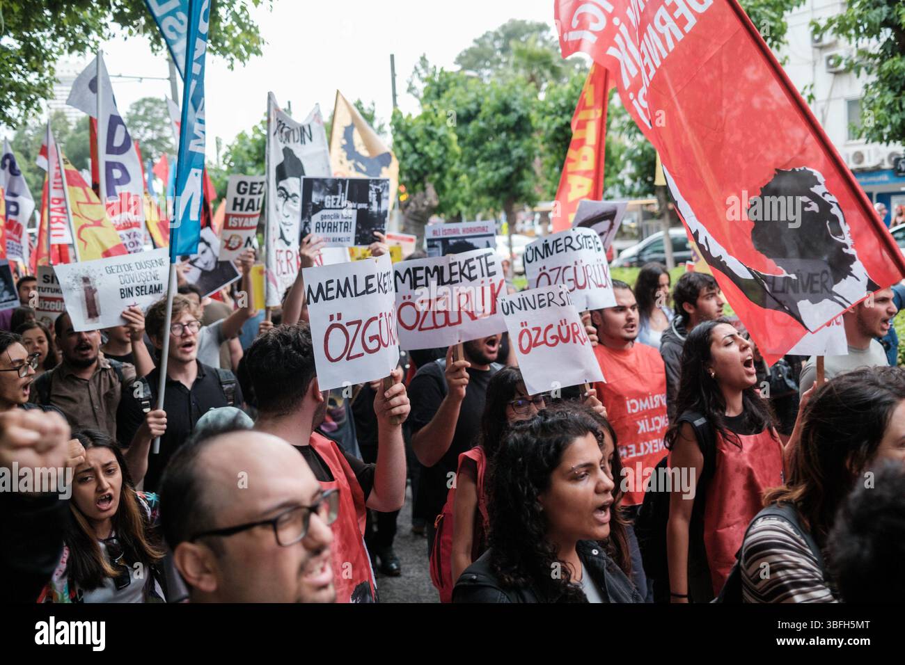 Protesters hold flags and placards expressing their opinion during the ...
