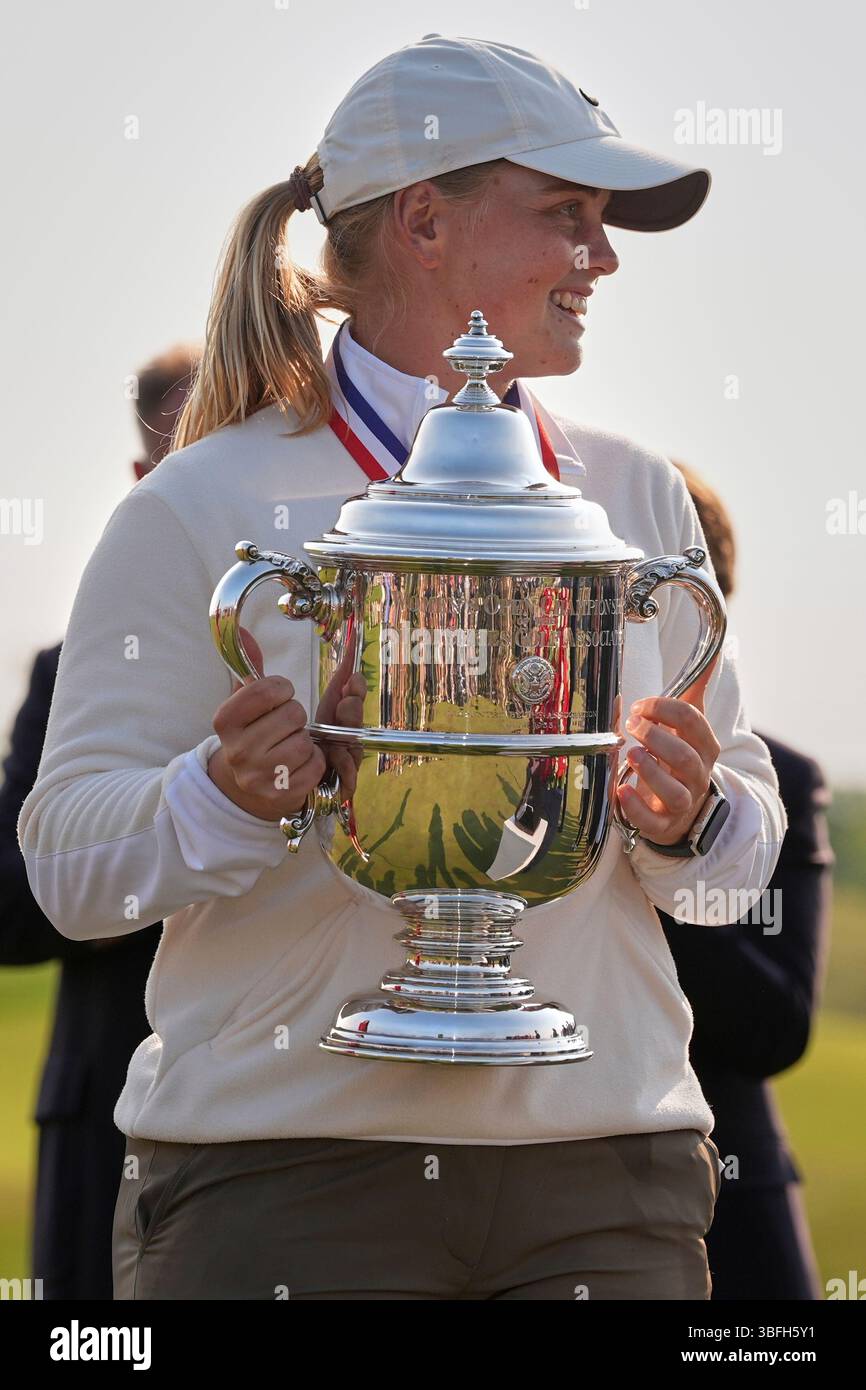 Maja Stark, of Sweden, Holds her winning trophy after winning the U.S ...