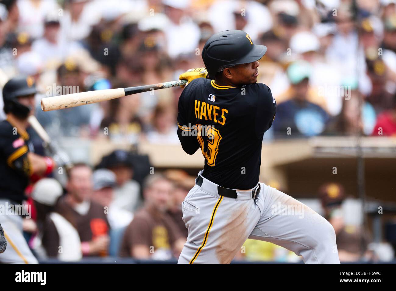 Pittsburgh Pirates' Ke'Bryan Hayes follows through on a swing during an ...