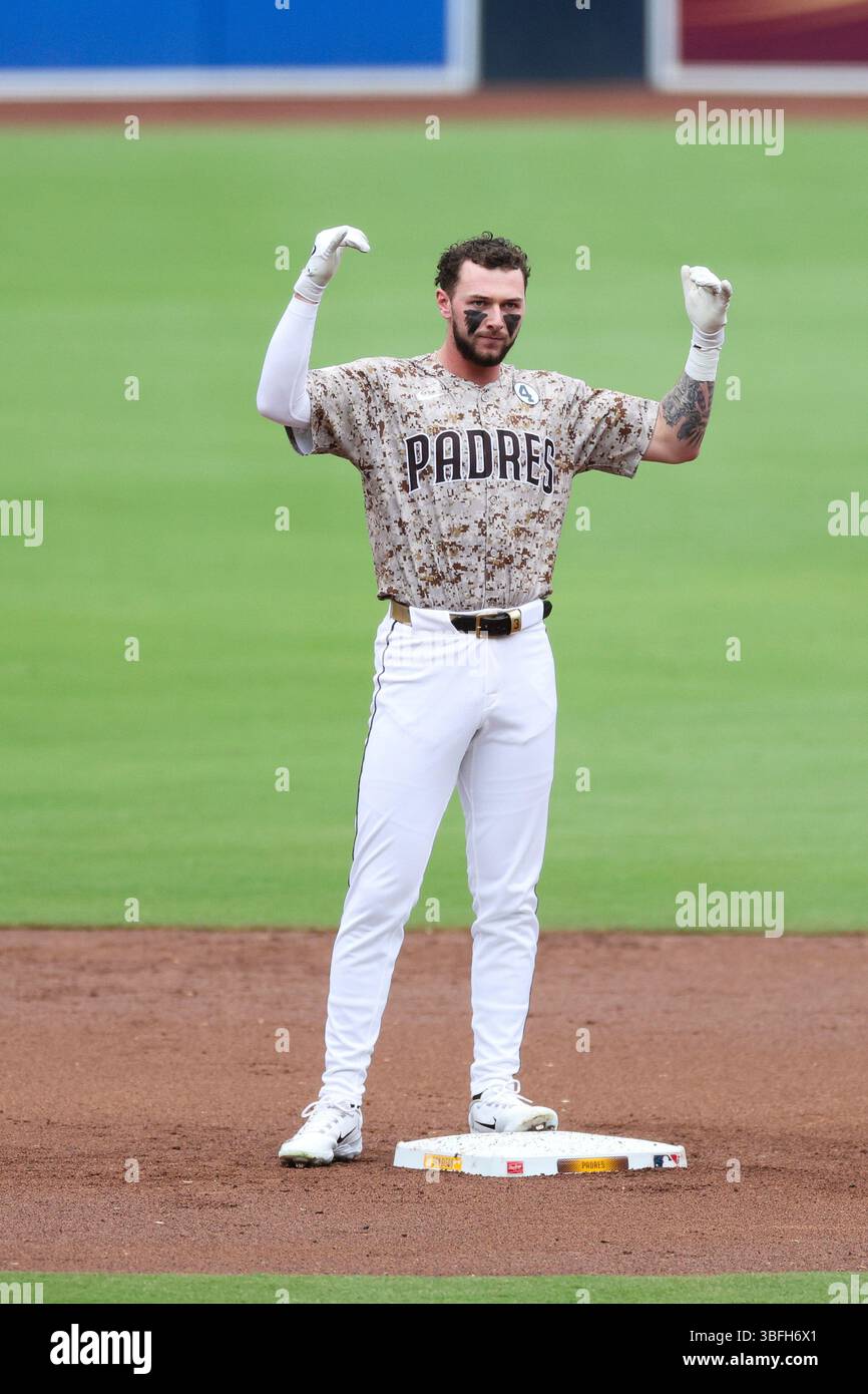 San Diego Padres' Jackson Merrill celebrates after hitting a double ...