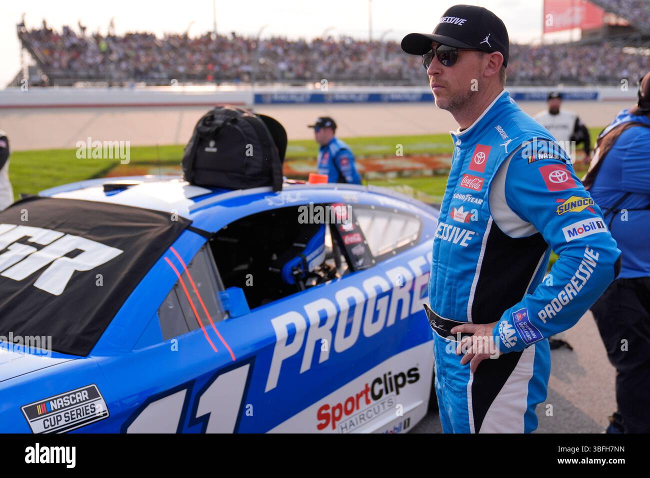Denny Hamlin waits for the start of a NASCAR Cup Series auto race ...