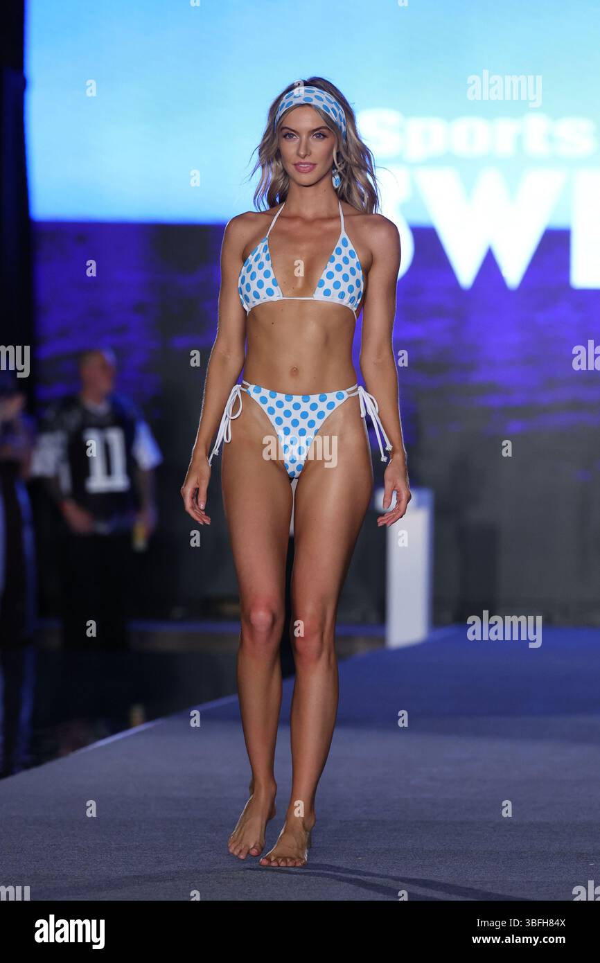 MIAMI BEACH, FLORIDA - MAY 31: Ally Mason walks the runway at the Sports Illustrated Swimsuit ...