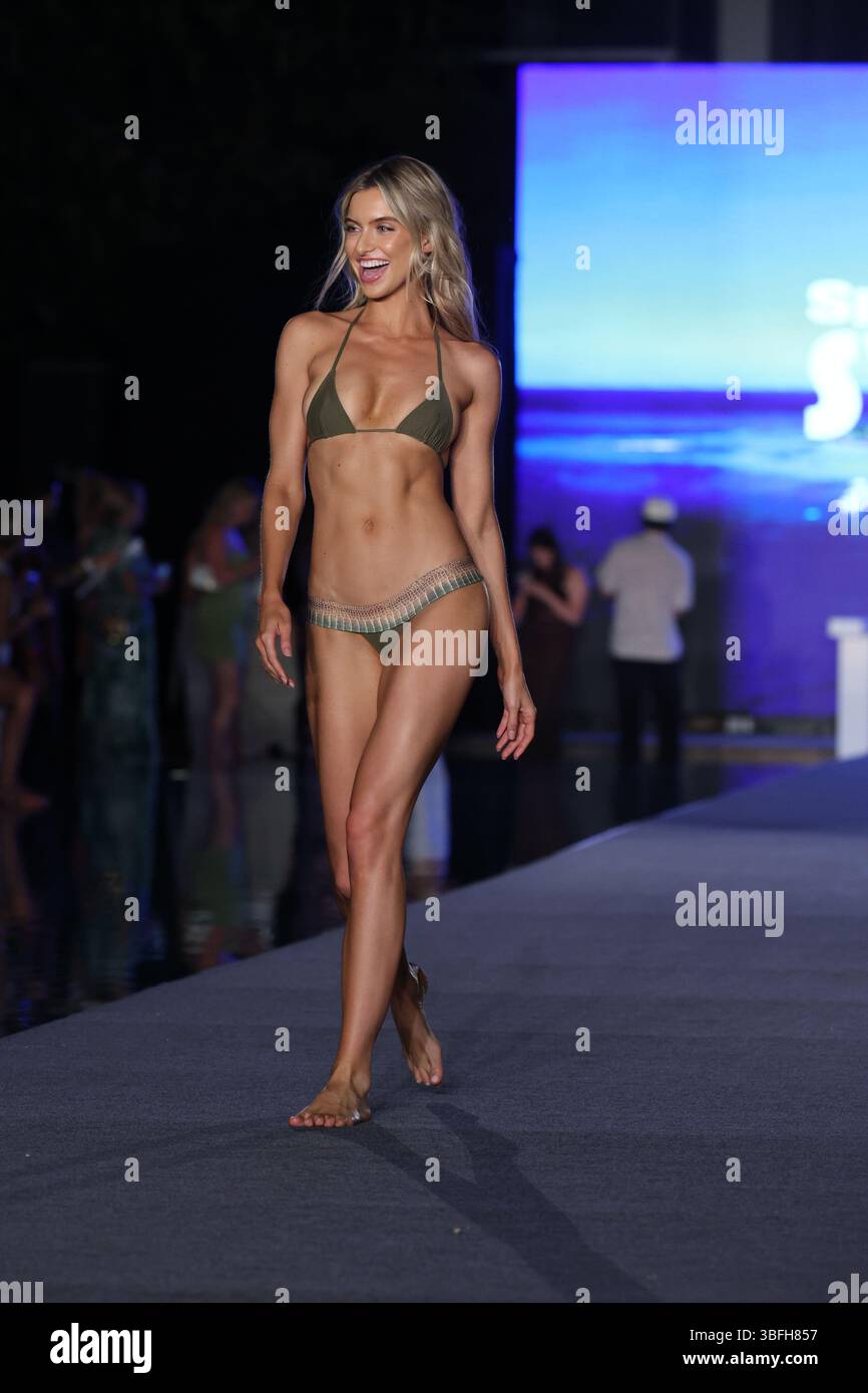 MIAMI BEACH, FLORIDA - MAY 31: Ally Mason walks the runway at the Sports Illustrated Swimsuit ...