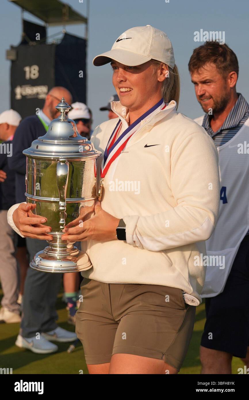 Maja Stark, of Sweden, holds her winning trophy after winning the U.S ...