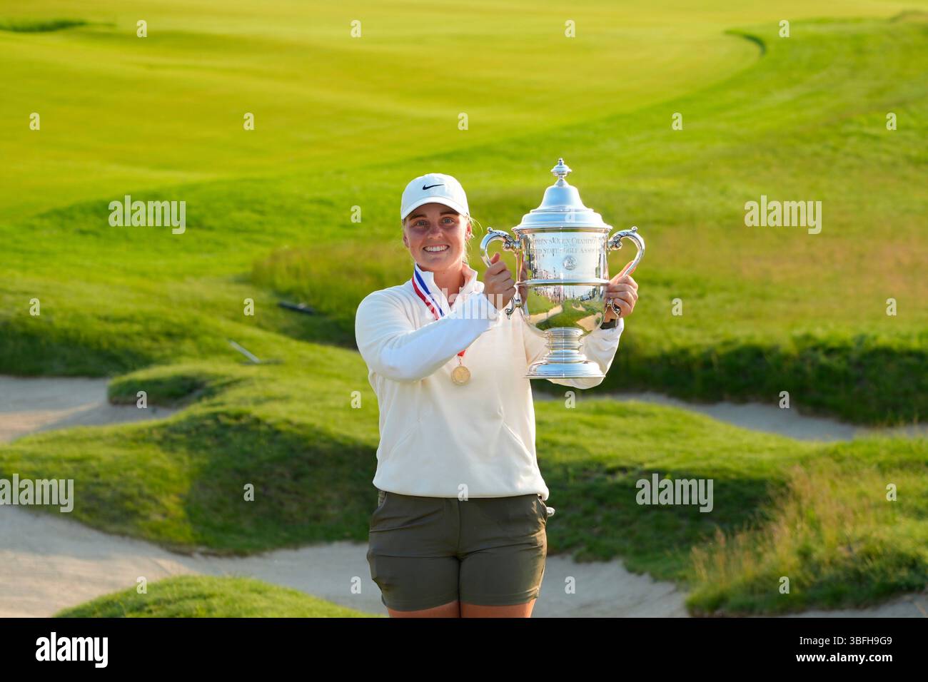 Maja Stark, of Sweden, holds her winning trophy after winning the U.S ...
