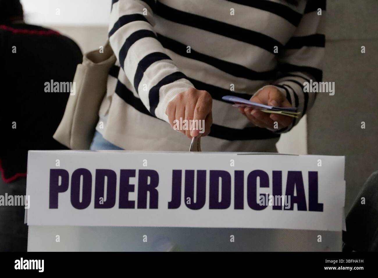 Mexico City, Mexico. 01st June, 2025. A Mexican citizen voting at ...