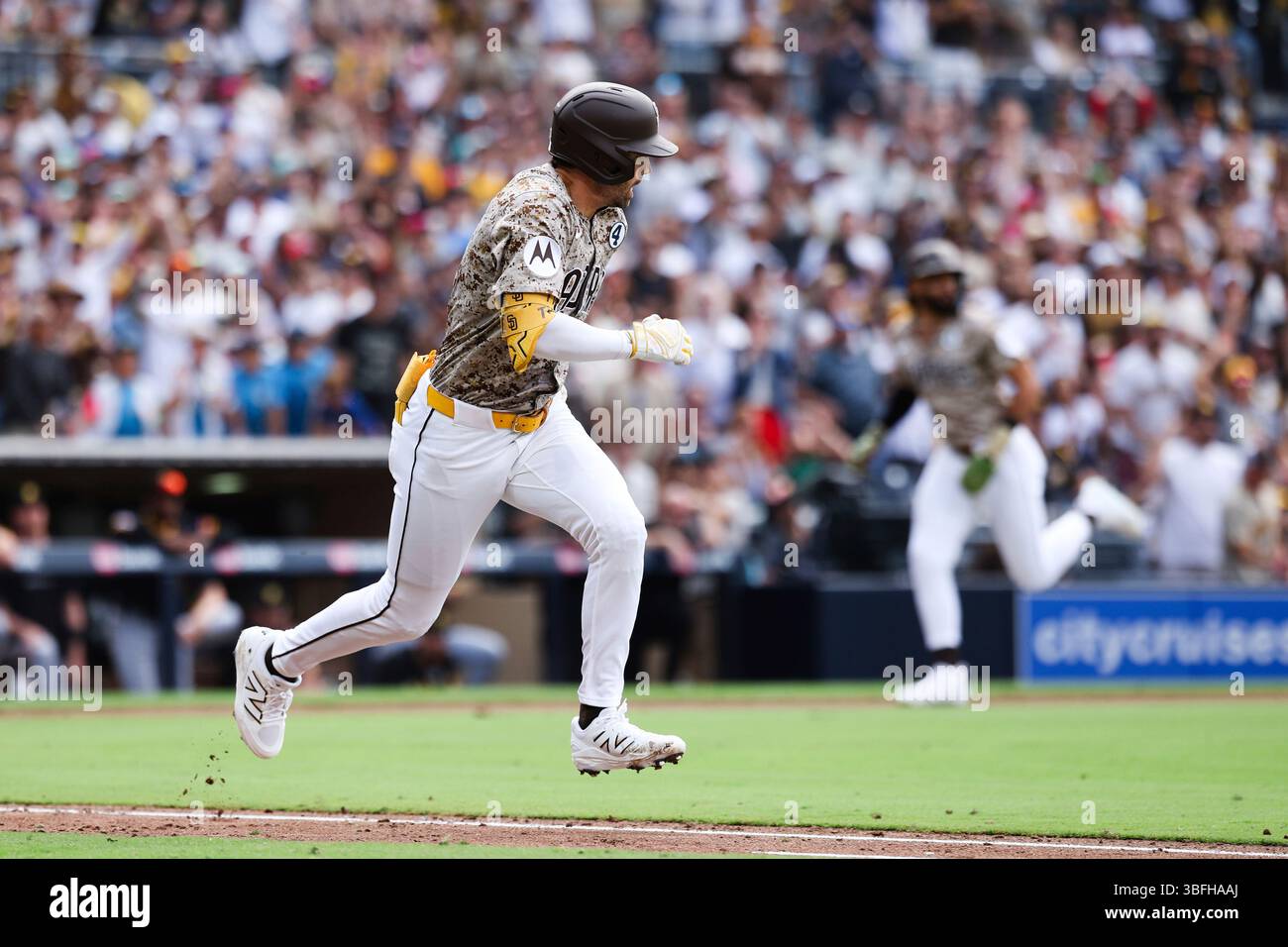 San Diego Padres' Tyler Wade watches his RBI single against the ...