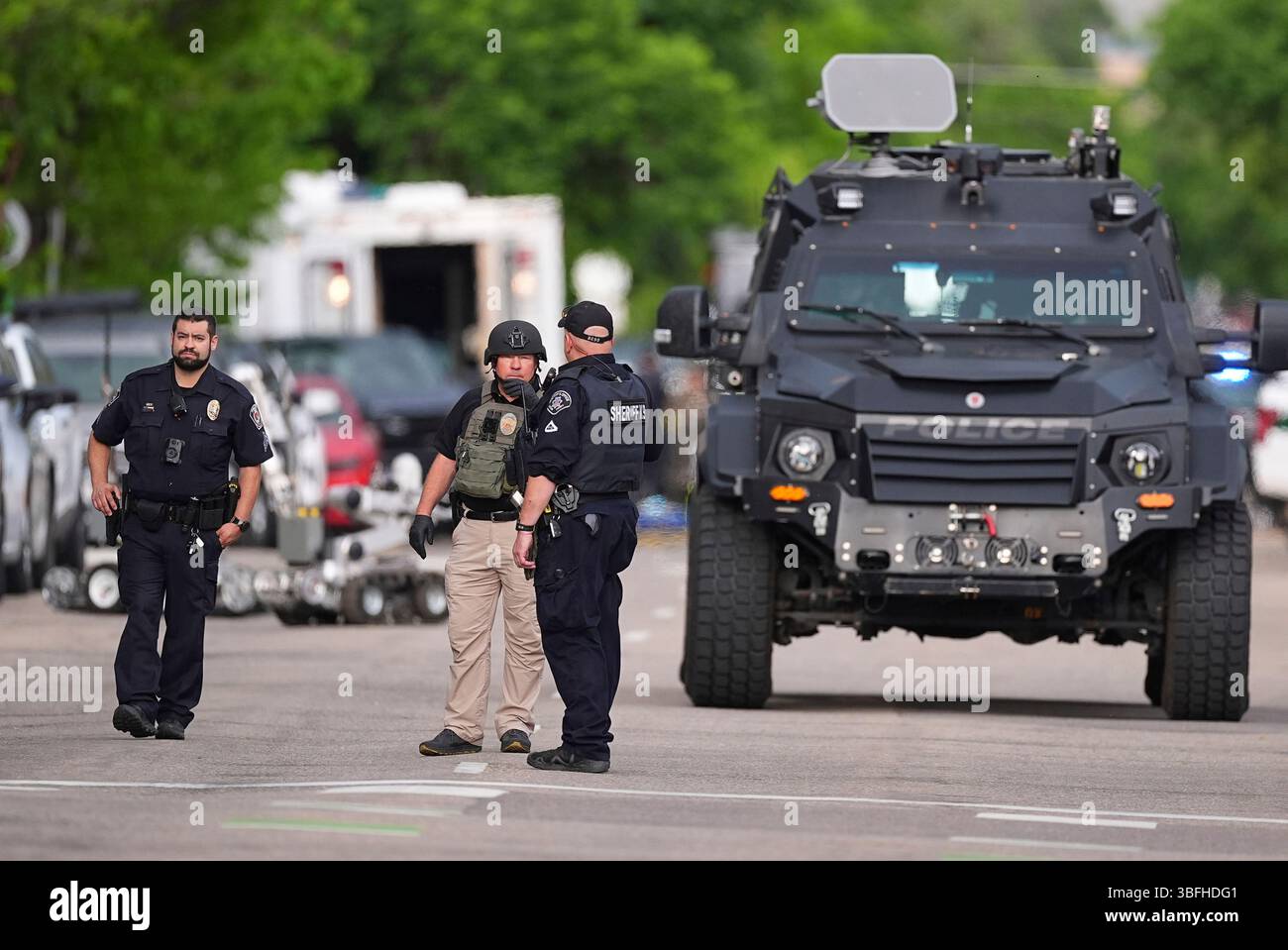 Law enforcement officials investigate after an attack on the Pearl ...