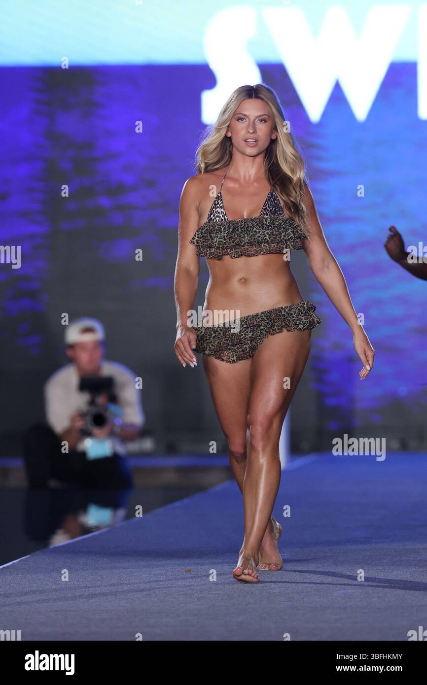 MIAMI BEACH, FLORIDA - MAY 31: Xandra Pohl, DJ XANDRA walks the runway ...
