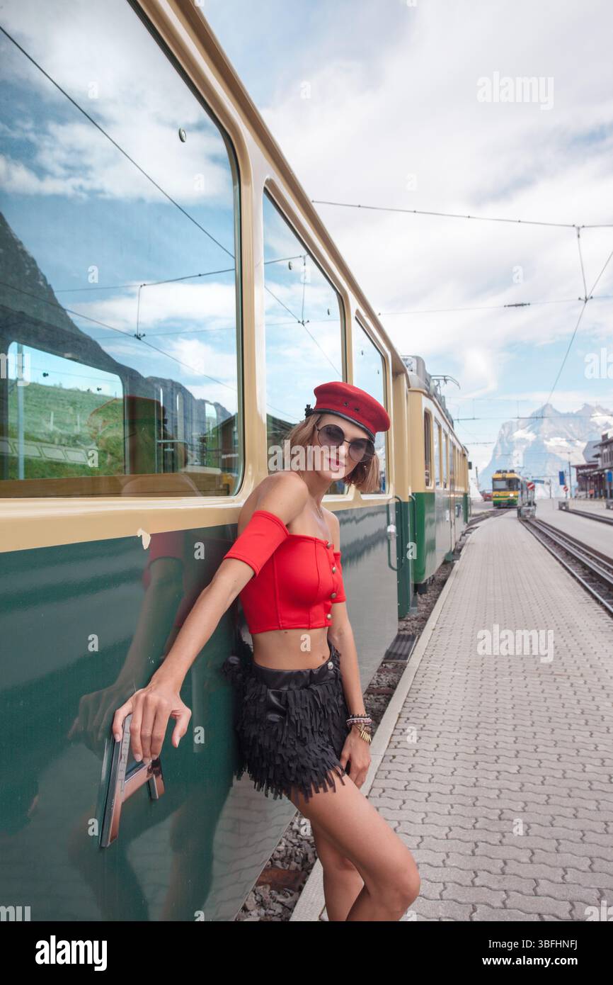 Looking at camera smiling standing beauty fashion model transportation ...