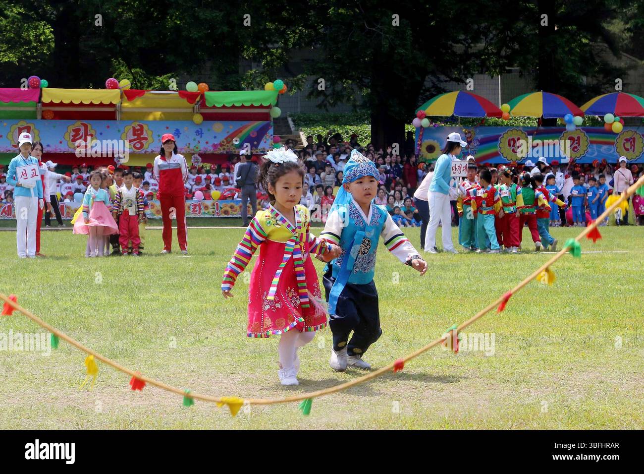 Children play jumping rope game as the 75th Joint Friendship Meeting is ...