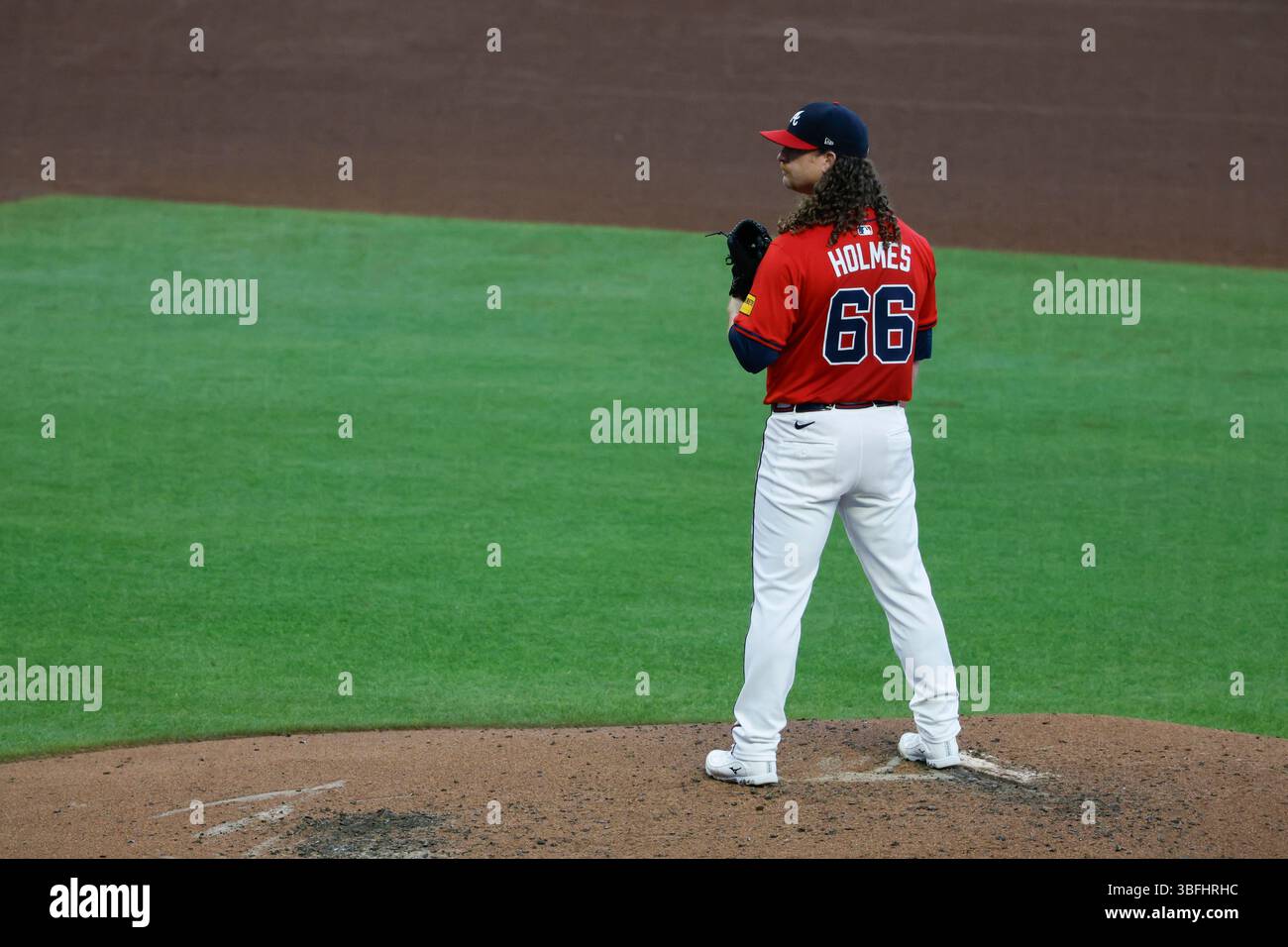 Atlanta Braves' Grant Holmes prepares to pitch during the fourth inning ...