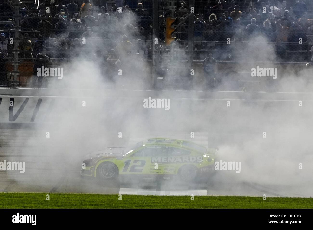 Ryan Blaney does a burnout after winning a NASCAR Cup Series auto race Sunday, June 1, 2025, in ...