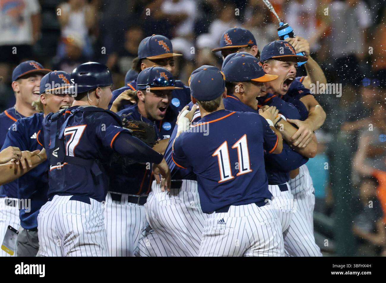 AUSTIN, TX - JUNE 01: UTSA players rush the field to celebrate winning ...