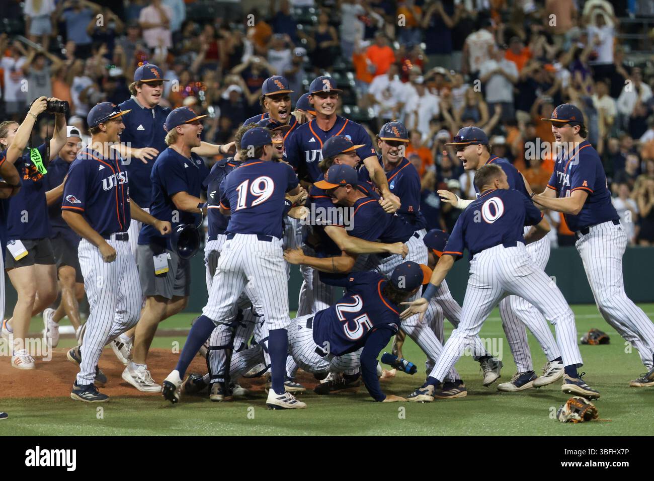 AUSTIN, TX - JUNE 01: UTSA players celebrate as others fall to the ...