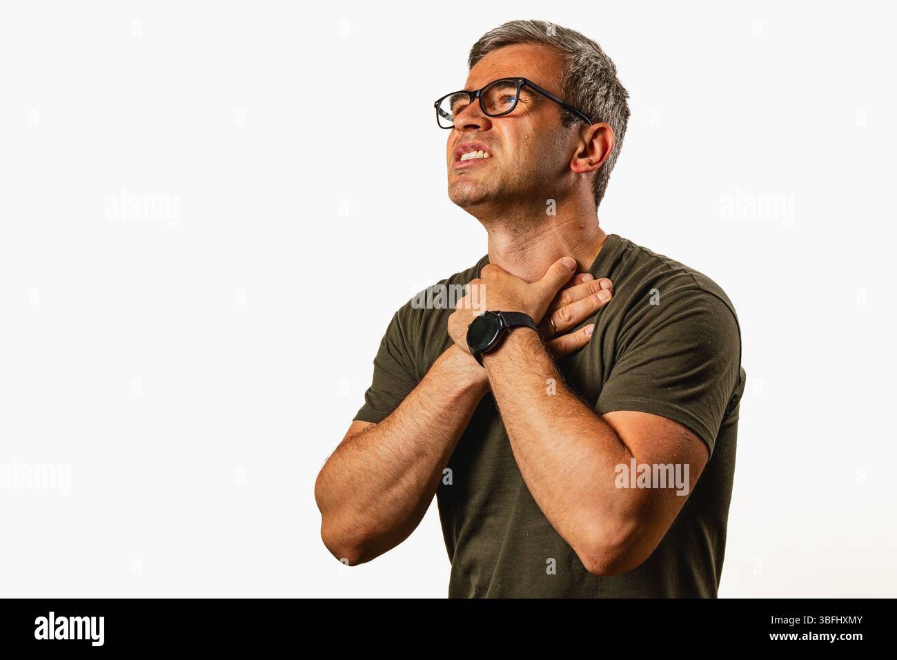 Man expresses pain holding hi-res stock photography and images - Alamy