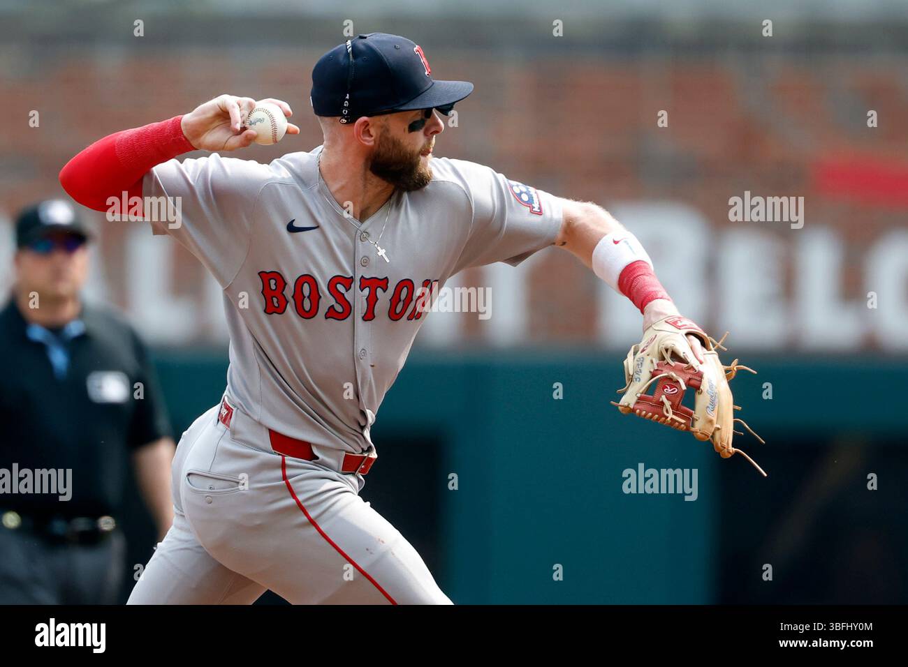 Boston Red Sox shortstop Trevor Story throws to first for the out on ...
