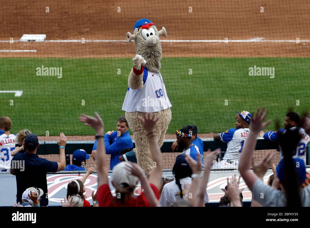 Atlanta Braves mascot Blooper throws shirts to fans during the eighth ...